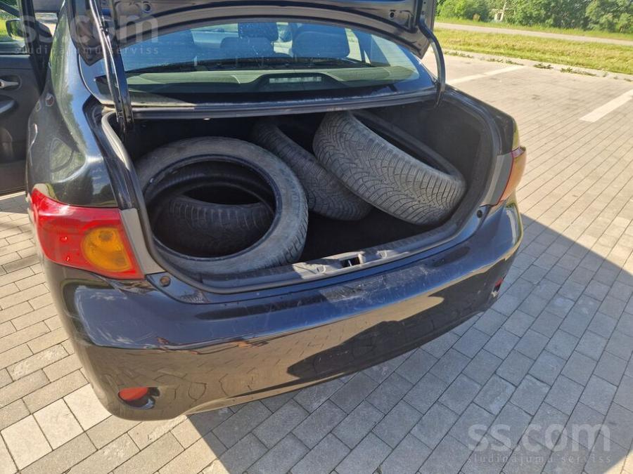 Melns Toyota Corolla 2008 Daugavpils, ar dzinēja tilpumu 2.00 L un nobraukumu 259 tūkst. km par 3500 €, foto 8 vietnē AUTOMOTO.COM.LV