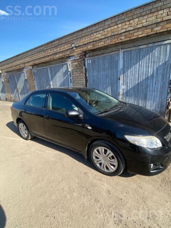 Melns Toyota Corolla 2009 Rīga, ar dzinēja tilpumu 1.40 L un nobraukumu 174 tūkst. km par 1750 €, foto 3 vietnē AUTOMOTO.COM.LV