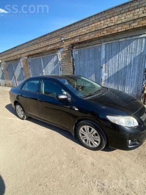 Melns Toyota Corolla 2009 Rīga, ar dzinēja tilpumu 1.40 L un nobraukumu 174 tūkst. km par 1750 €, foto 4 vietnē AUTOMOTO.COM.LV
