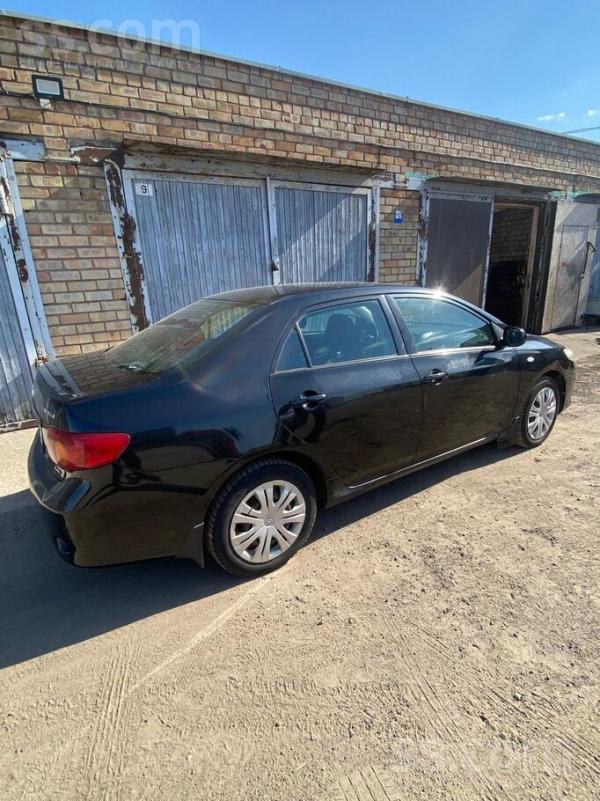 Melns Toyota Corolla 2009 Rīga, ar dzinēja tilpumu 1.40 L un nobraukumu 174 tūkst. km par 1750 €, foto 4 vietnē AUTOMOTO.COM.LV