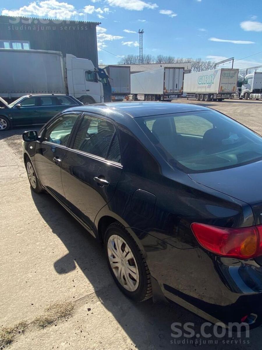 Melns Toyota Corolla 2009 Rīga, ar dzinēja tilpumu 1.40 L un nobraukumu 174 tūkst. km par 1750 €, foto 7 vietnē AUTOMOTO.COM.LV