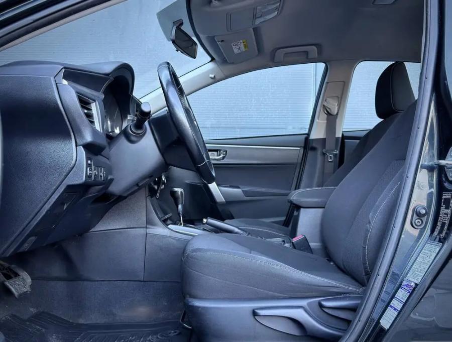 Black Toyota Corolla 2013 in Riga, with an engine capacity of 1.60 L and mileage of 139 thousand km for 7550 €, photo 9 on AUTOMOTO.COM.LV