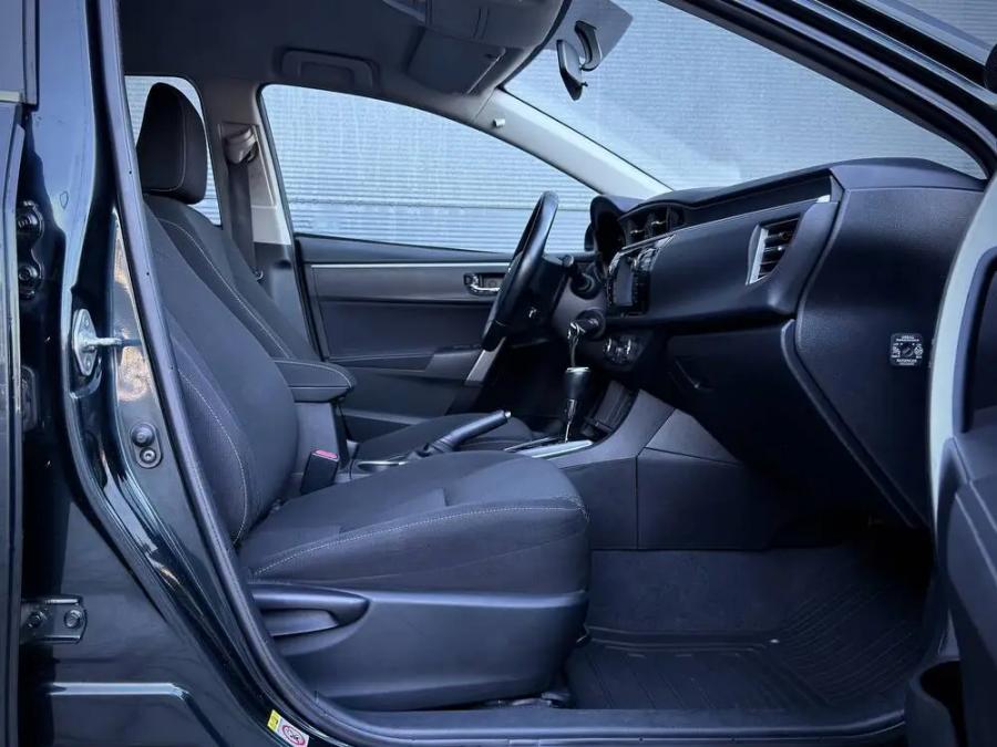 Black Toyota Corolla 2013 in Riga, with an engine capacity of 1.60 L and mileage of 139 thousand km for 7550 €, photo 21 on AUTOMOTO.COM.LV
