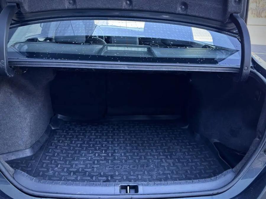 Black Toyota Corolla 2013 in Riga, with an engine capacity of 1.60 L and mileage of 139 thousand km for 7550 €, photo 24 on AUTOMOTO.COM.LV