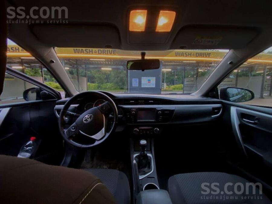 Black Toyota Corolla 2014 in Riga, with an engine capacity of 1.60 L and mileage of 314 thousand km for 6500 €, photo 6 on AUTOMOTO.COM.LV