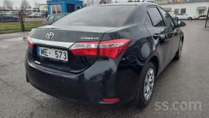Black Toyota Corolla 2015 in Riga, with an engine capacity of 1.60 L and mileage of 273 thousand km for 6390 €, photo 5 on AUTOMOTO.COM.LV