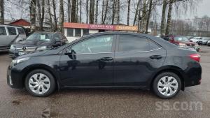 Black Toyota Corolla 2015 in Riga, with an engine capacity of 1.60 L and mileage of 273 thousand km for 6390 €, photo 10 on AUTOMOTO.COM.LV
