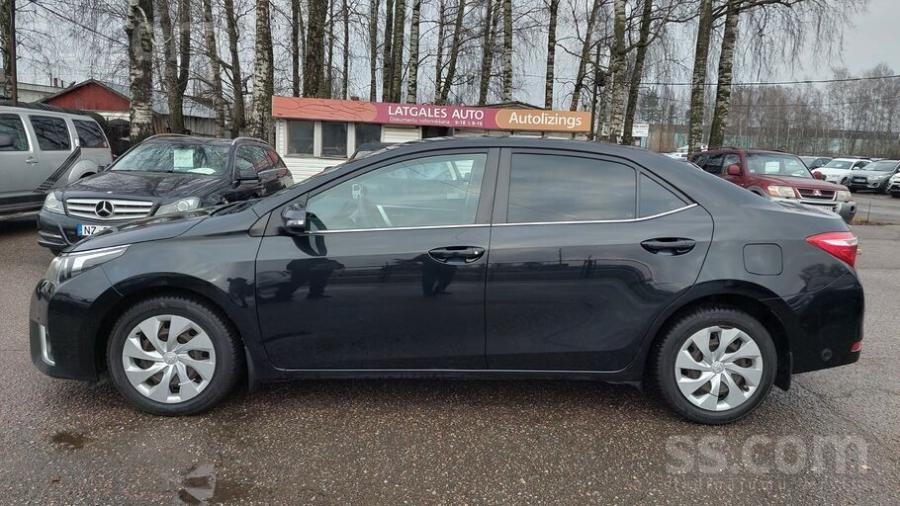 Black Toyota Corolla 2015 in Riga, with an engine capacity of 1.60 L and mileage of 273 thousand km for 6390 €, photo 10 on AUTOMOTO.COM.LV