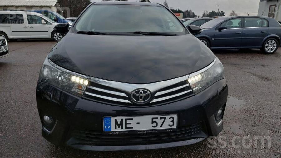 Black Toyota Corolla 2015 in Riga, with an engine capacity of 1.60 L and mileage of 273 thousand km for 6390 €, photo 13 on AUTOMOTO.COM.LV