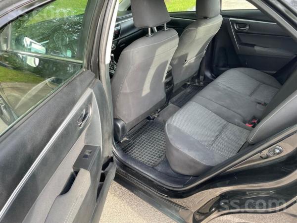 Black Toyota Corolla 2015 in Riga, with an engine capacity of 1.60 L and mileage of 429 thousand km for 4690 €, photo 10 on AUTOMOTO.COM.LV