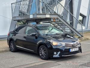 Black Toyota Corolla 2015 in Riga, with an engine capacity of 1.60 L and mileage of 222 thousand km for 7350 €, photo  on AUTOMOTO.COM.LV