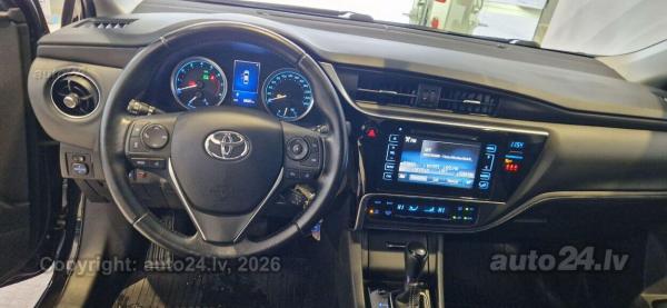 Black Toyota Corolla 2017 in Narva, with an engine capacity of 1.60 L and mileage of 65 thousand km for 12490 €, photo 11 on AUTOMOTO.COM.LV