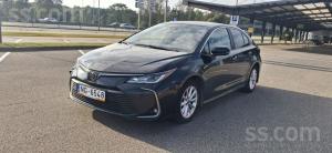Black Toyota Corolla 2022 in Riga, with an engine capacity of 1.50 L and mileage of 24 thousand km for 17999 €, photo  on AUTOMOTO.COM.LV