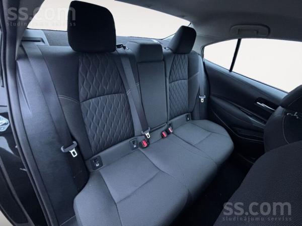 Black Toyota Corolla 2023 in Riga, with an engine capacity of 1.50 L and mileage of 63 thousand km for 17500 €, photo 8 on AUTOMOTO.COM.LV
