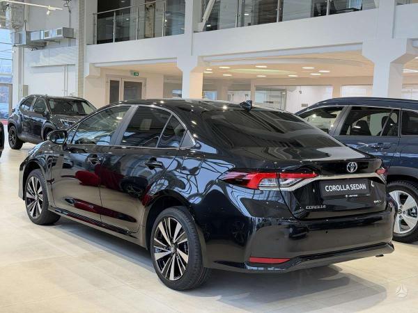 Melns Toyota Corolla 2026 Panevēža, ar dzinēja tilpumu 1.80 L un nobraukumu 1 tūkst. km par 27990 €, foto 6 vietnē AUTOMOTO.COM.LV