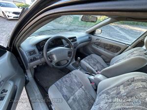 Melns Toyota Corolla 1998 Valga, ar dzinēja tilpumu 1.30 L un nobraukumu 0 tūkst. km par 1399 €, foto 9 vietnē AUTOMOTO.COM.LV