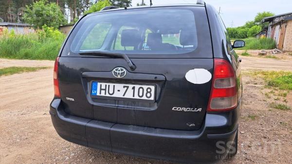 Melns Toyota Corolla 2002 Daugavpils, ar dzinēja tilpumu 2.00 L un nobraukumu 300 tūkst. km par 650 €, foto 2 vietnē AUTOMOTO.COM.LV