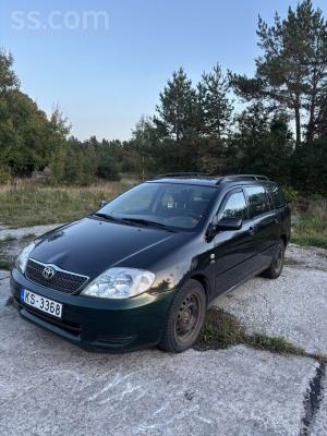 Black Toyota Corolla 2003 in Liepaja, with an engine capacity of 2.00 L and mileage of 355 thousand km for 1050 €, photo  on AUTOMOTO.COM.LV