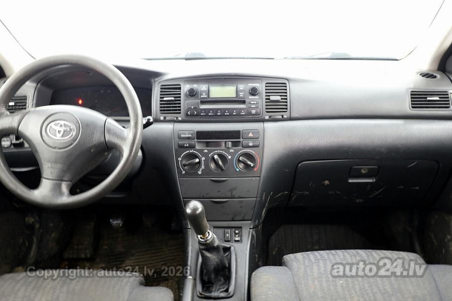 Melns Toyota Corolla 2004 Tallina, ar dzinēja tilpumu 2.00 L un nobraukumu 535 tūkst. km par 799 €, foto 5 vietnē AUTOMOTO.COM.LV