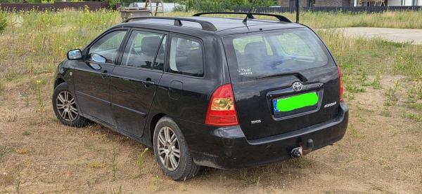 Black Toyota Corolla 2005 in Vilnius, with an engine capacity of 1.36 L and mileage of 293 thousand km for 1950 €, photo 4 on AUTOMOTO.COM.LV