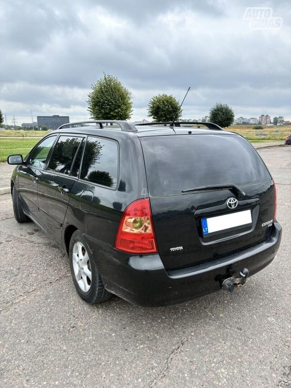 Black Toyota Corolla 2006 in Kaunas, with an engine capacity of 2.00 L and mileage of 415 thousand km for 1600 €, photo 6 on AUTOMOTO.COM.LV