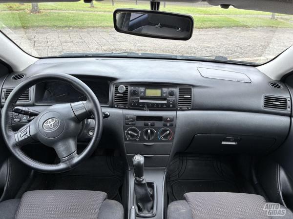Black Toyota Corolla 2006 in Kaunas, with an engine capacity of 2.00 L and mileage of 415 thousand km for 1600 €, photo 7 on AUTOMOTO.COM.LV