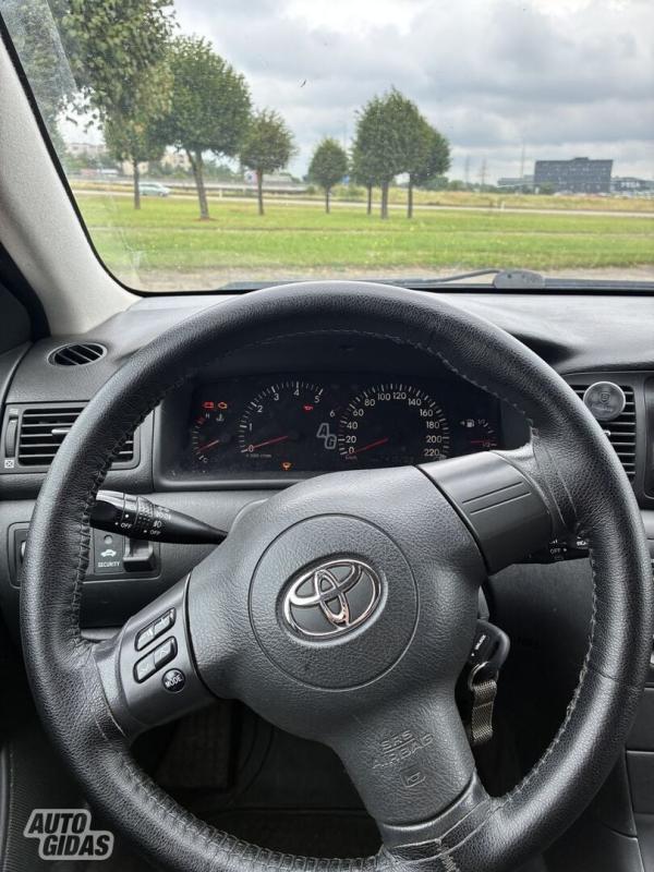 Black Toyota Corolla 2006 in Kaunas, with an engine capacity of 2.00 L and mileage of 415 thousand km for 1600 €, photo 8 on AUTOMOTO.COM.LV
