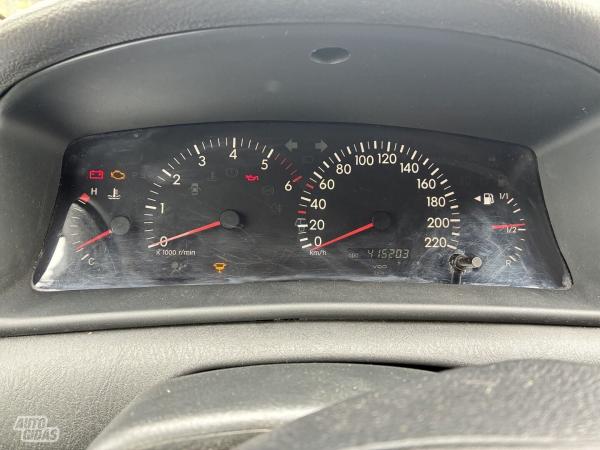 Black Toyota Corolla 2006 in Kaunas, with an engine capacity of 2.00 L and mileage of 415 thousand km for 1600 €, photo 9 on AUTOMOTO.COM.LV