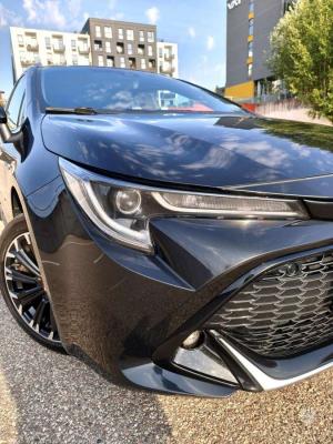 Black Toyota Corolla 2021 in Vilnius, with an engine capacity of 1.80 L and mileage of 75 thousand km for 21900 €, photo 3 on AUTOMOTO.COM.LV