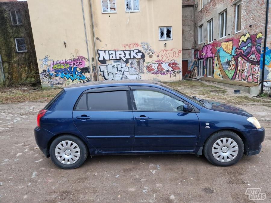 Blue Toyota Corolla 2002 in Klaipeda, with an engine capacity of 2.00 L and mileage of 220 thousand km for 500 €, photo 7 on AUTOMOTO.COM.LV
