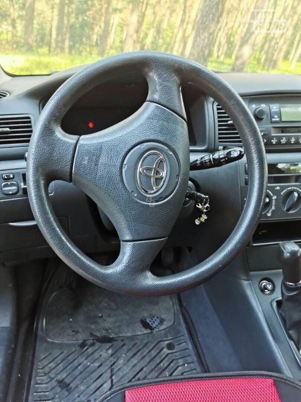 Zils Toyota Corolla 2002 Kaišiadorys, ar dzinēja tilpumu 1.40 L un nobraukumu 205 tūkst. km par 990 €, foto 8 vietnē AUTOMOTO.COM.LV