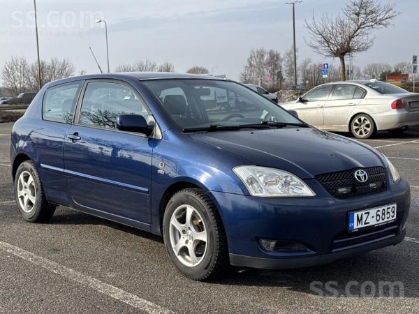 Zils Toyota Corolla 2003 Rīga, ar dzinēja tilpumu 2.00 L un nobraukumu 250 tūkst. km par 1750 €, foto 1 vietnē AUTOMOTO.COM.LV