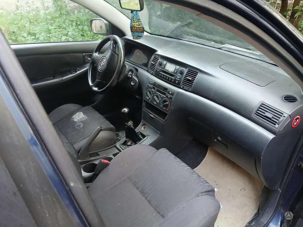 Blue Toyota Corolla 2003 in Vilnius, with an engine capacity of 2.00 L and mileage of 300 thousand km for 800 €, photo 6 on AUTOMOTO.COM.LV