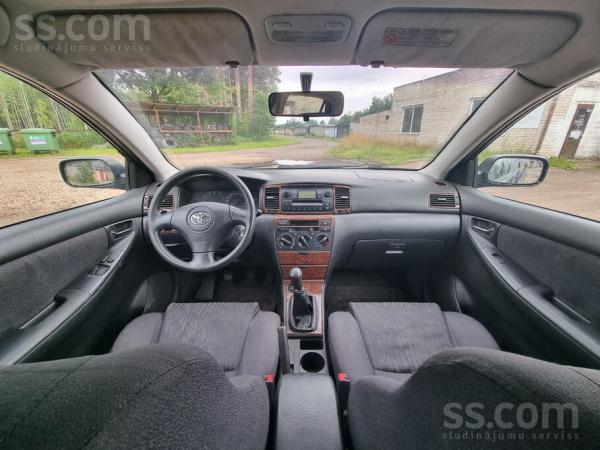 Zils Toyota Corolla 2003 Rīga, ar dzinēja tilpumu 2.00 L un nobraukumu 384 tūkst. km par 1100 €, foto 5 vietnē AUTOMOTO.COM.LV