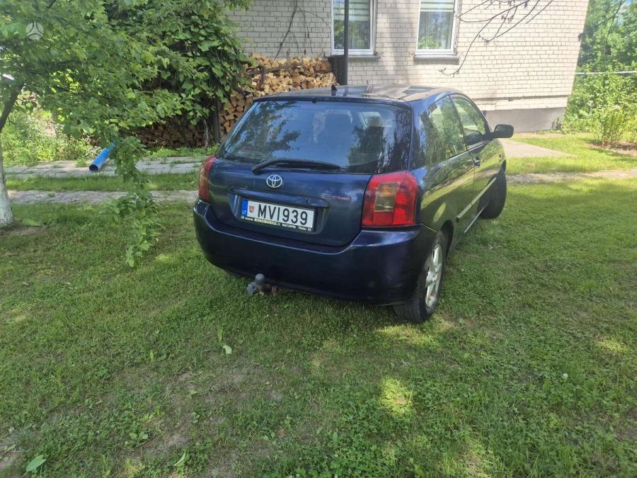 Zils Toyota Corolla 2004 Viļņa, ar dzinēja tilpumu 2.00 L un nobraukumu 270 tūkst. km par 1000 €, foto 6 vietnē AUTOMOTO.COM.LV