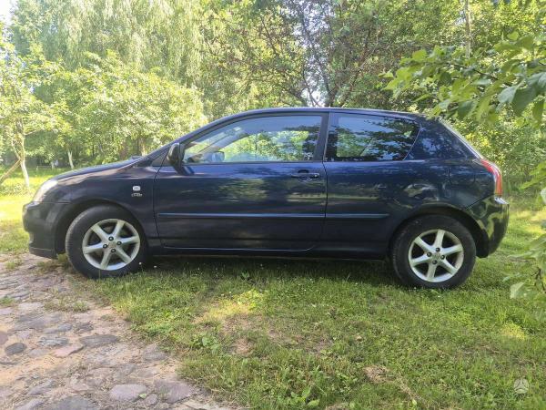 Blue Toyota Corolla 2004 in Vilnius, with an engine capacity of 2.00 L and mileage of 270 thousand km for 1000 €, photo 8 on AUTOMOTO.COM.LV