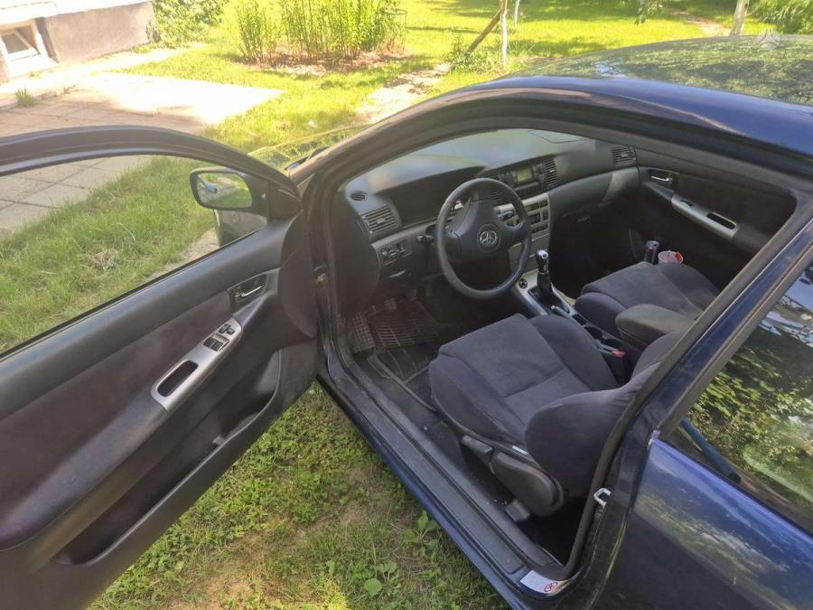 Zils Toyota Corolla 2004 Viļņa, ar dzinēja tilpumu 2.00 L un nobraukumu 270 tūkst. km par 1000 €, foto 10 vietnē AUTOMOTO.COM.LV