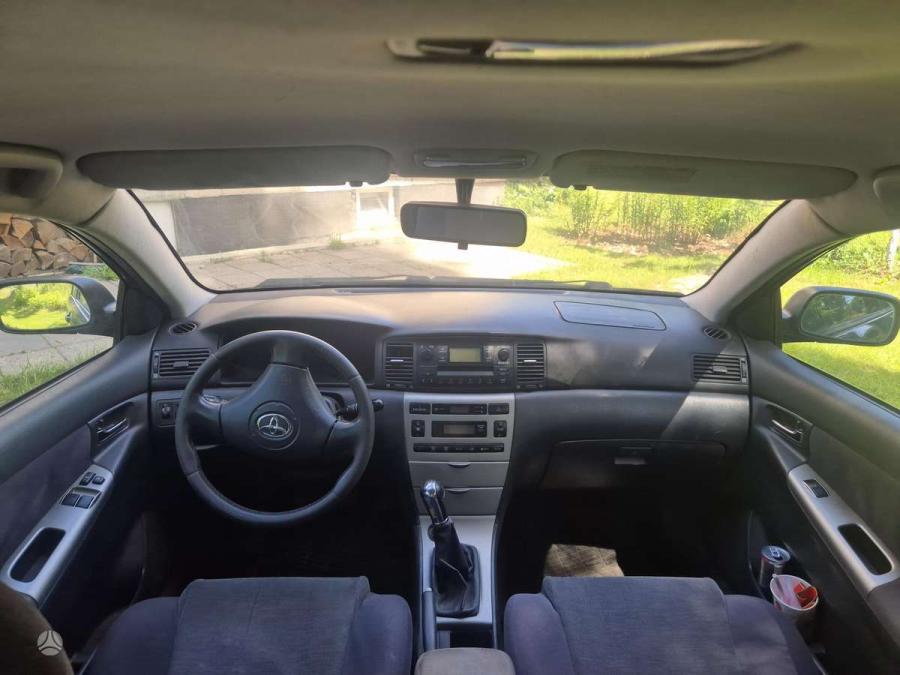 Zils Toyota Corolla 2004 Viļņa, ar dzinēja tilpumu 2.00 L un nobraukumu 270 tūkst. km par 1000 €, foto 12 vietnē AUTOMOTO.COM.LV