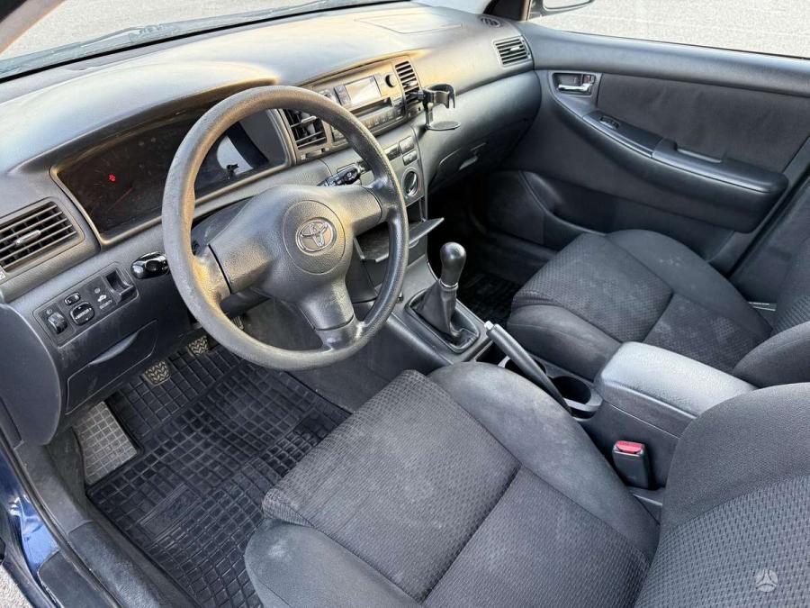 Zils Toyota Corolla 2005 Viļņa, ar dzinēja tilpumu 1.60 L un nobraukumu 285 tūkst. km par 850 €, foto 6 vietnē AUTOMOTO.COM.LV