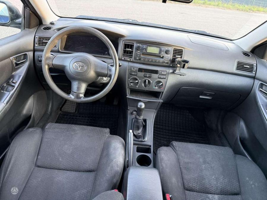 Zils Toyota Corolla 2005 Viļņa, ar dzinēja tilpumu 1.60 L un nobraukumu 285 tūkst. km par 850 €, foto 7 vietnē AUTOMOTO.COM.LV