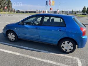 Zils Toyota Corolla 2006 Rīga, ar dzinēja tilpumu 1.60 L un nobraukumu 172 tūkst. km par 2999 €, foto  vietnē AUTOMOTO.COM.LV