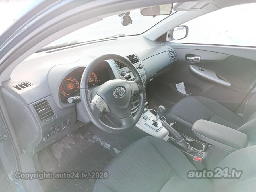 Zils Toyota Corolla 2008 Tallina, ar dzinēja tilpumu 1.60 L un nobraukumu 182 tūkst. km par 4999 €, foto 19 vietnē AUTOMOTO.COM.LV
