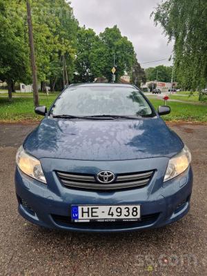 Zils Toyota Corolla 2008 Rīga, ar dzinēja tilpumu 1.60 L un nobraukumu 291 tūkst. km par 2500 €, foto  vietnē AUTOMOTO.COM.LV
