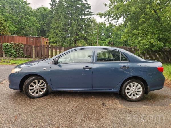 Zils Toyota Corolla 2008 Rīga, ar dzinēja tilpumu 1.60 L un nobraukumu 291 tūkst. km par 2500 €, foto 3 vietnē AUTOMOTO.COM.LV