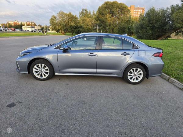 Zils Toyota Corolla 2024 Panevēža, ar dzinēja tilpumu 1.80 L un nobraukumu 66 tūkst. km par 21950 €, foto 9 vietnē AUTOMOTO.COM.LV