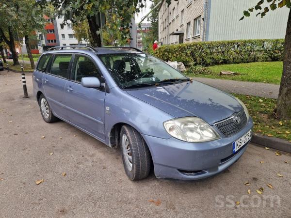 Zils Toyota Corolla 2004 Ogre, ar dzinēja tilpumu 2.00 L un nobraukumu 283 tūkst. km par 1650 €, foto 1 vietnē AUTOMOTO.COM.LV