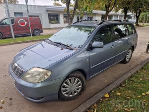 Zils Toyota Corolla 2004 Ogre, ar dzinēja tilpumu 2.00 L un nobraukumu 283 tūkst. km par 1650 €, foto 3 vietnē AUTOMOTO.COM.LV