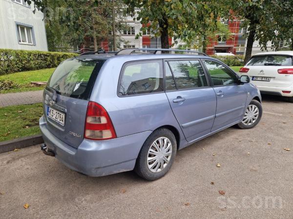 Zils Toyota Corolla 2004 Ogre, ar dzinēja tilpumu 2.00 L un nobraukumu 283 tūkst. km par 1650 €, foto 5 vietnē AUTOMOTO.COM.LV