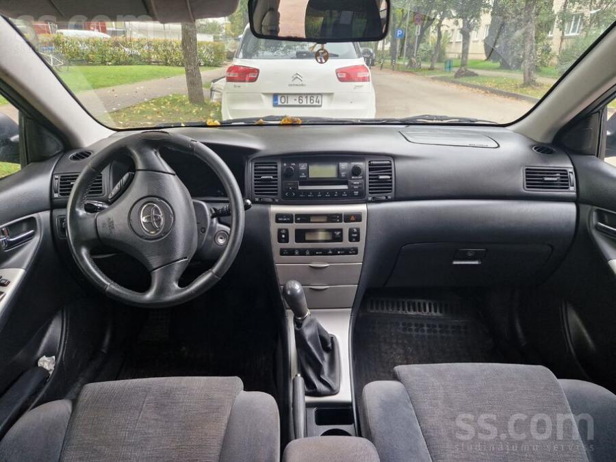 Zils Toyota Corolla 2004 Ogre, ar dzinēja tilpumu 2.00 L un nobraukumu 283 tūkst. km par 1650 €, foto 7 vietnē AUTOMOTO.COM.LV