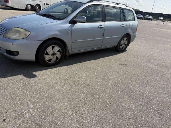 Zils Toyota Corolla 2005 Klaipėda, ar dzinēja tilpumu 2.00 L un nobraukumu 269 tūkst. km par 800 €, foto 4 vietnē AUTOMOTO.COM.LV